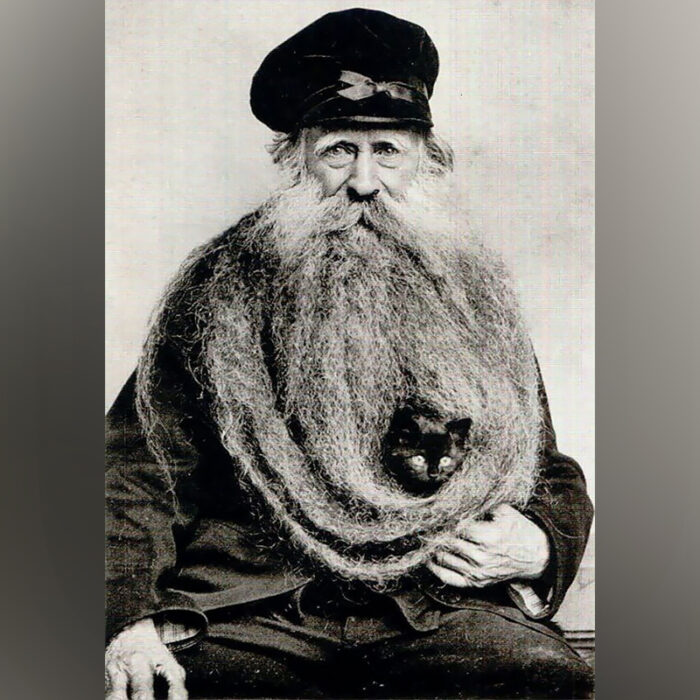French Man Achieves Fame for Nesting Cats in His Epic Beard